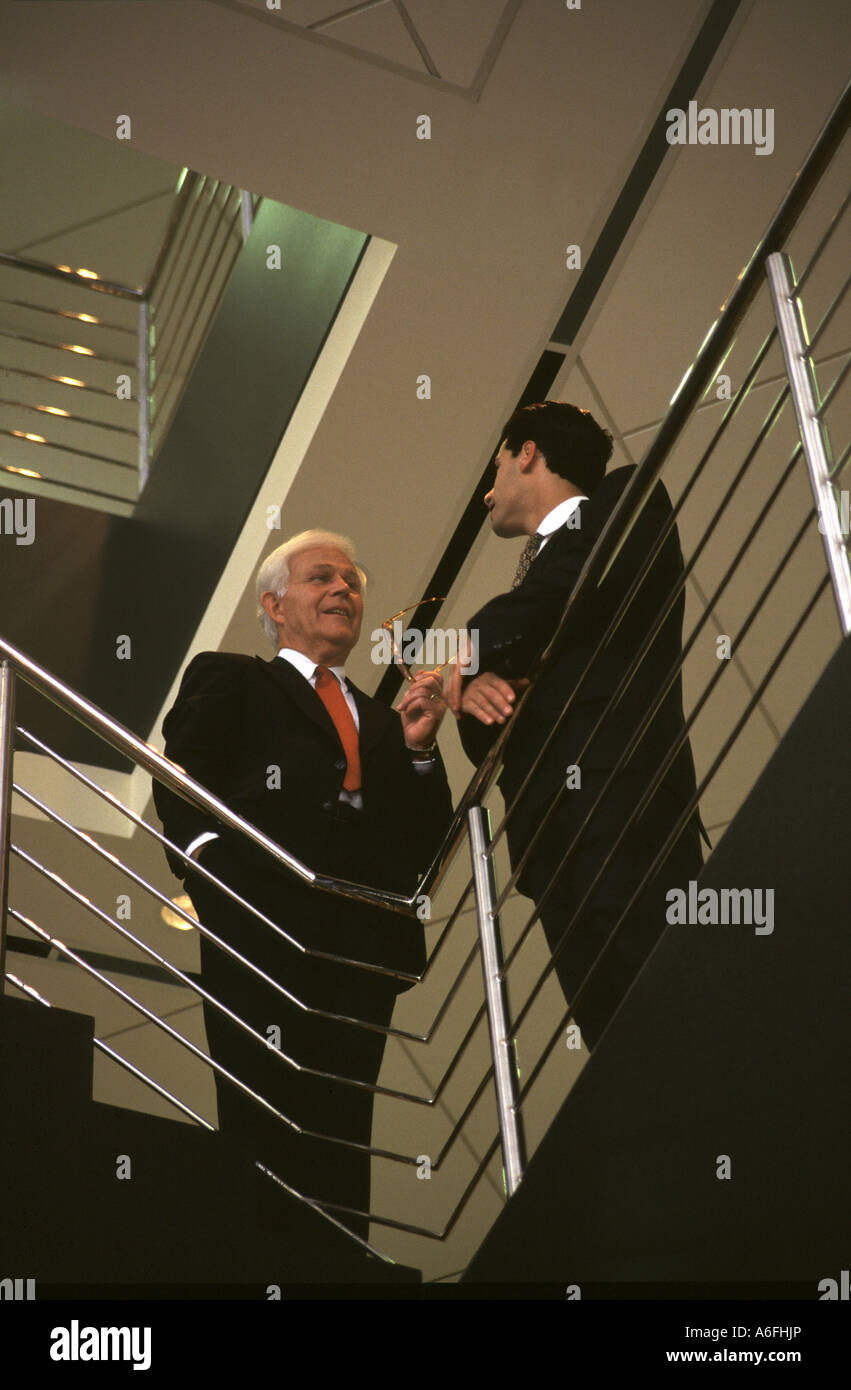 Business men in conversation Stock Photo - Alamy