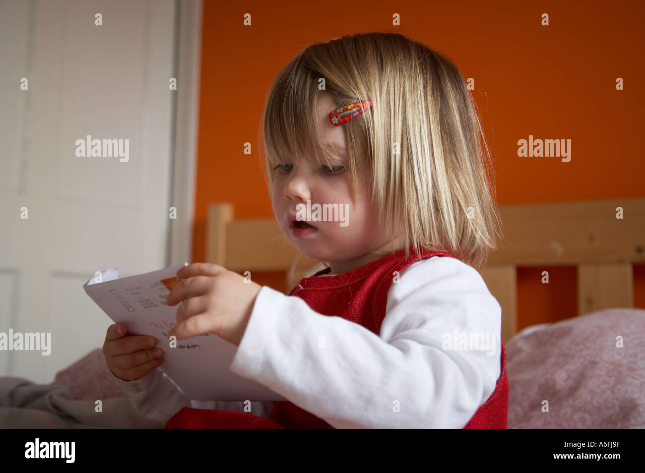 girl opening letter Stock Photo - Alamy
