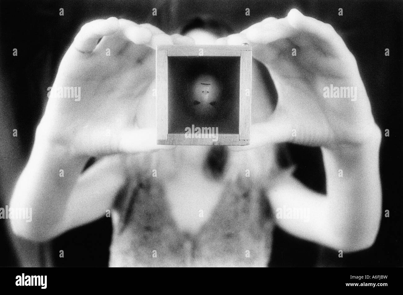 Box with face Stock Photo - Alamy