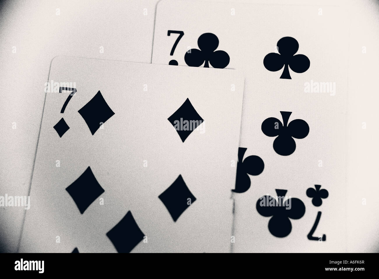 Playing cards - pair of sevens Stock Photo - Alamy