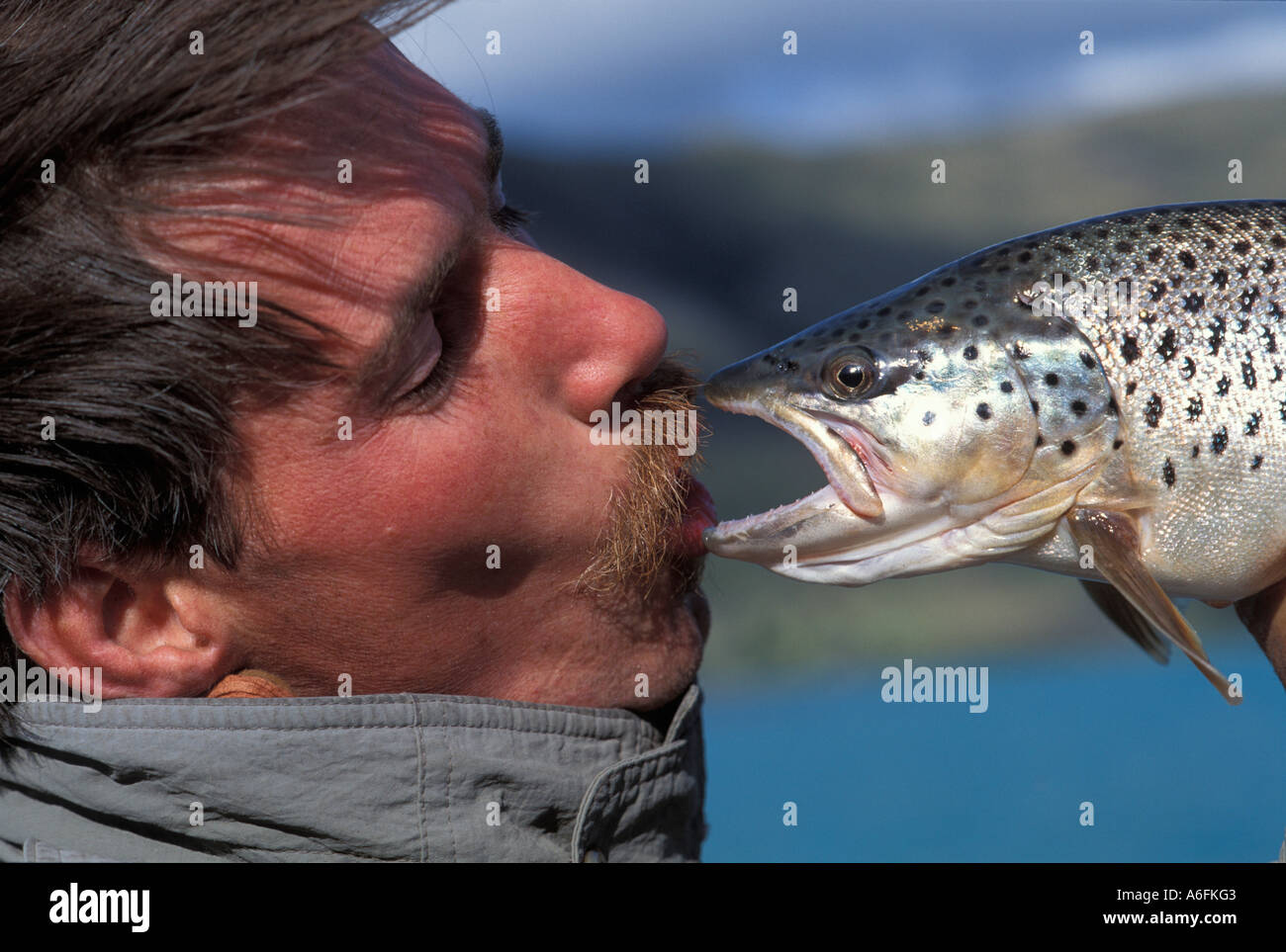 Man kissing his fish hi-res stock photography and images - Alamy