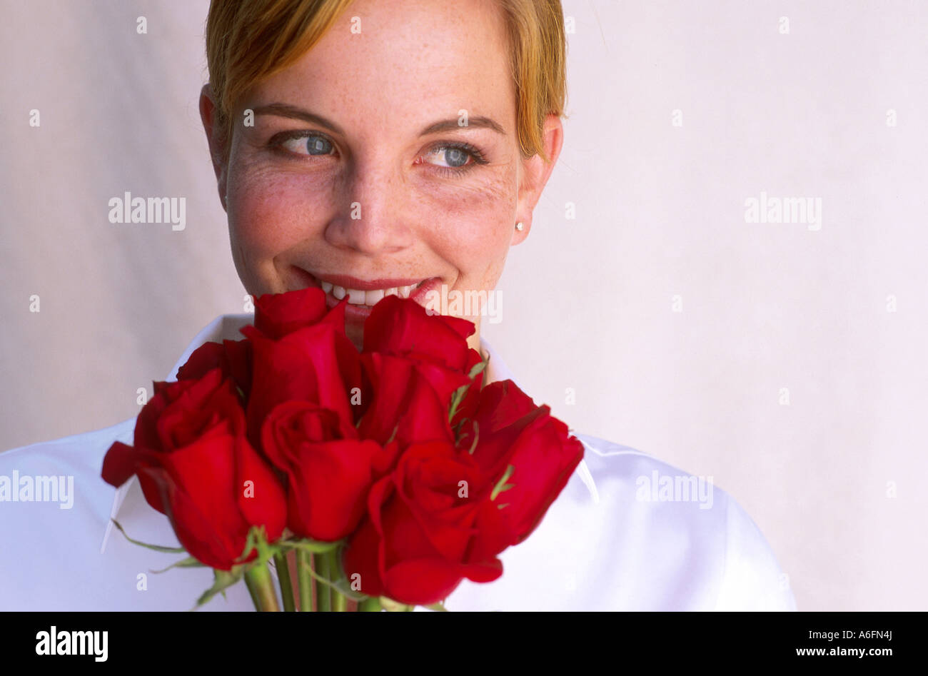 Laughter and red roses hi-res stock photography and images - Alamy