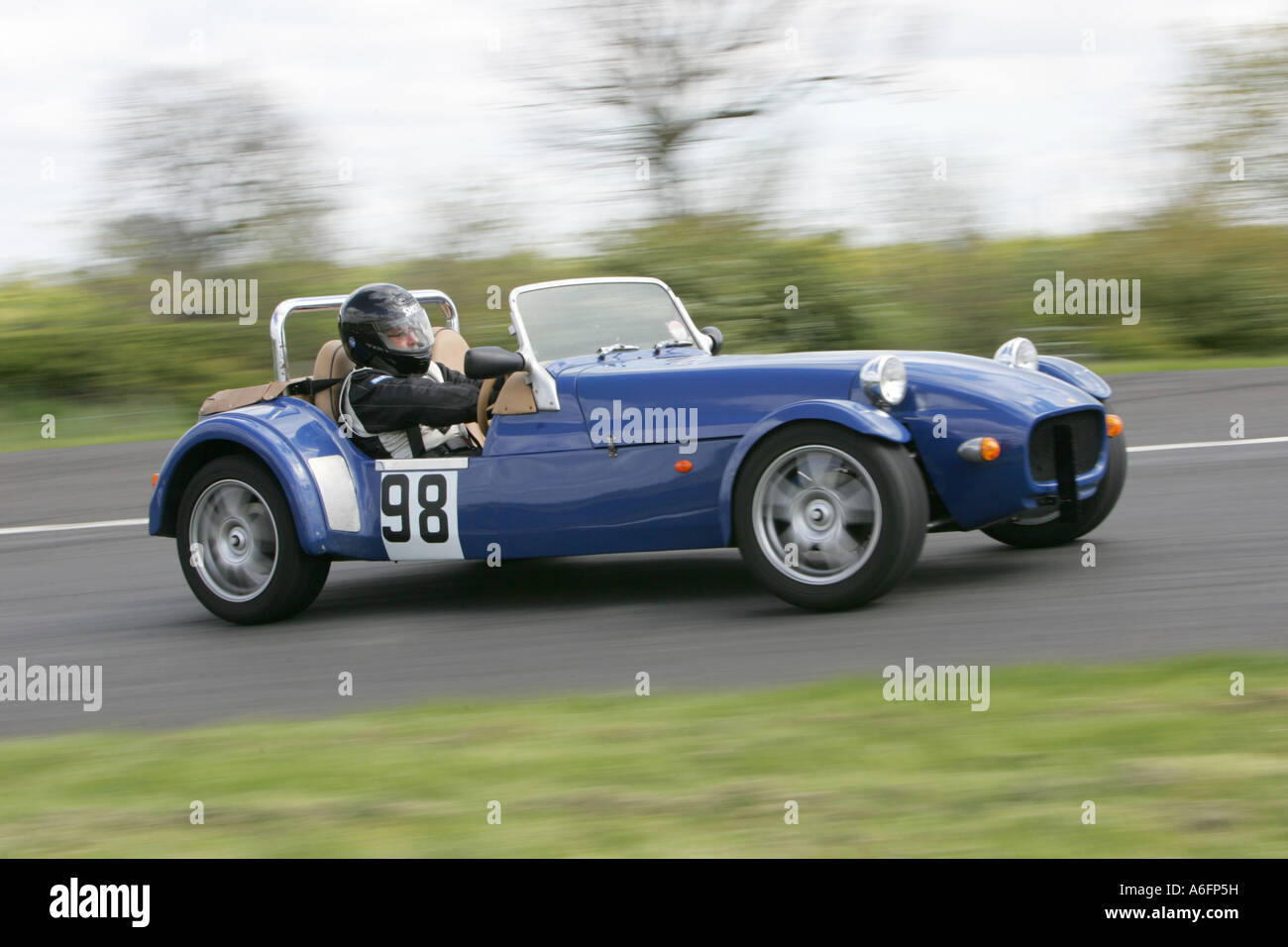 Sliding round the final bend at Harewood Stock Photo - Alamy
