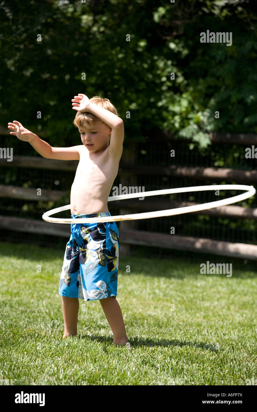 Hoola Hooping child on a sunny day Stock Photo - Alamy
