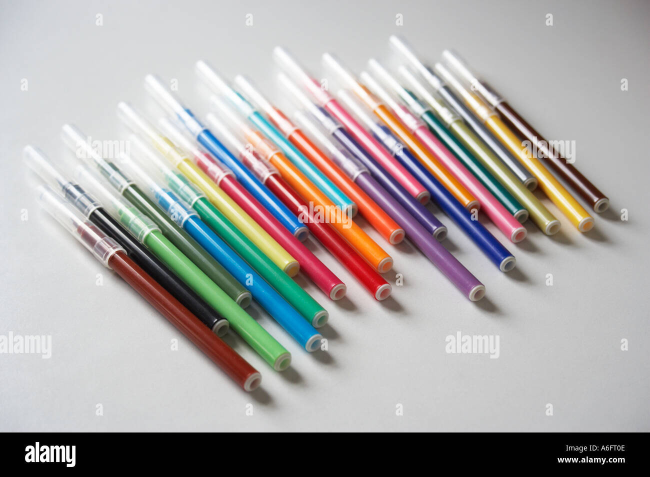 coloured pens in a row Stock Photo - Alamy