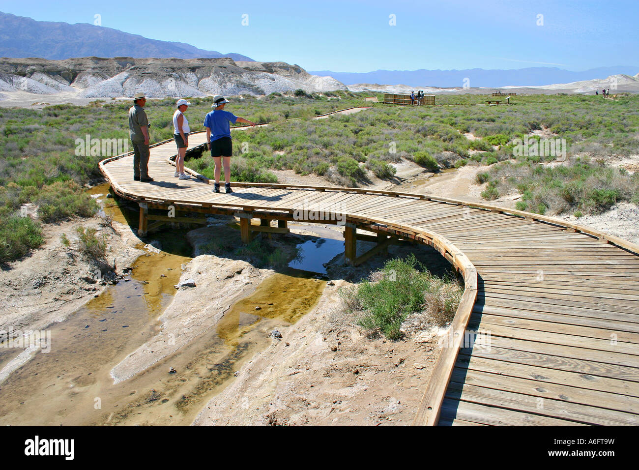 People on elevated wood walkway Salt Creek desert pupfish habitat Death ...