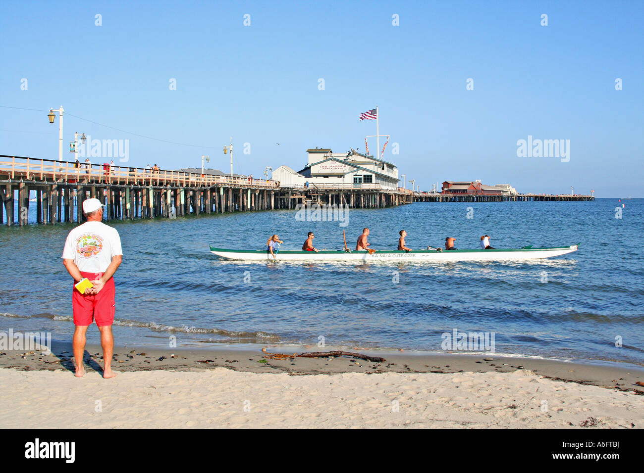 Coach watching rowing crew team Santa Barbara California Stock Photo ...