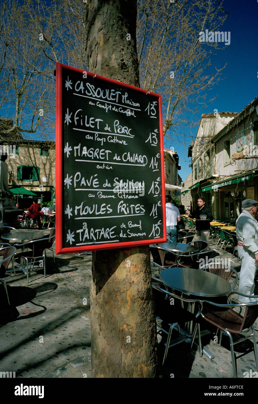 The menu for lunch displayed outside a restaurant in the Place Marcou ...