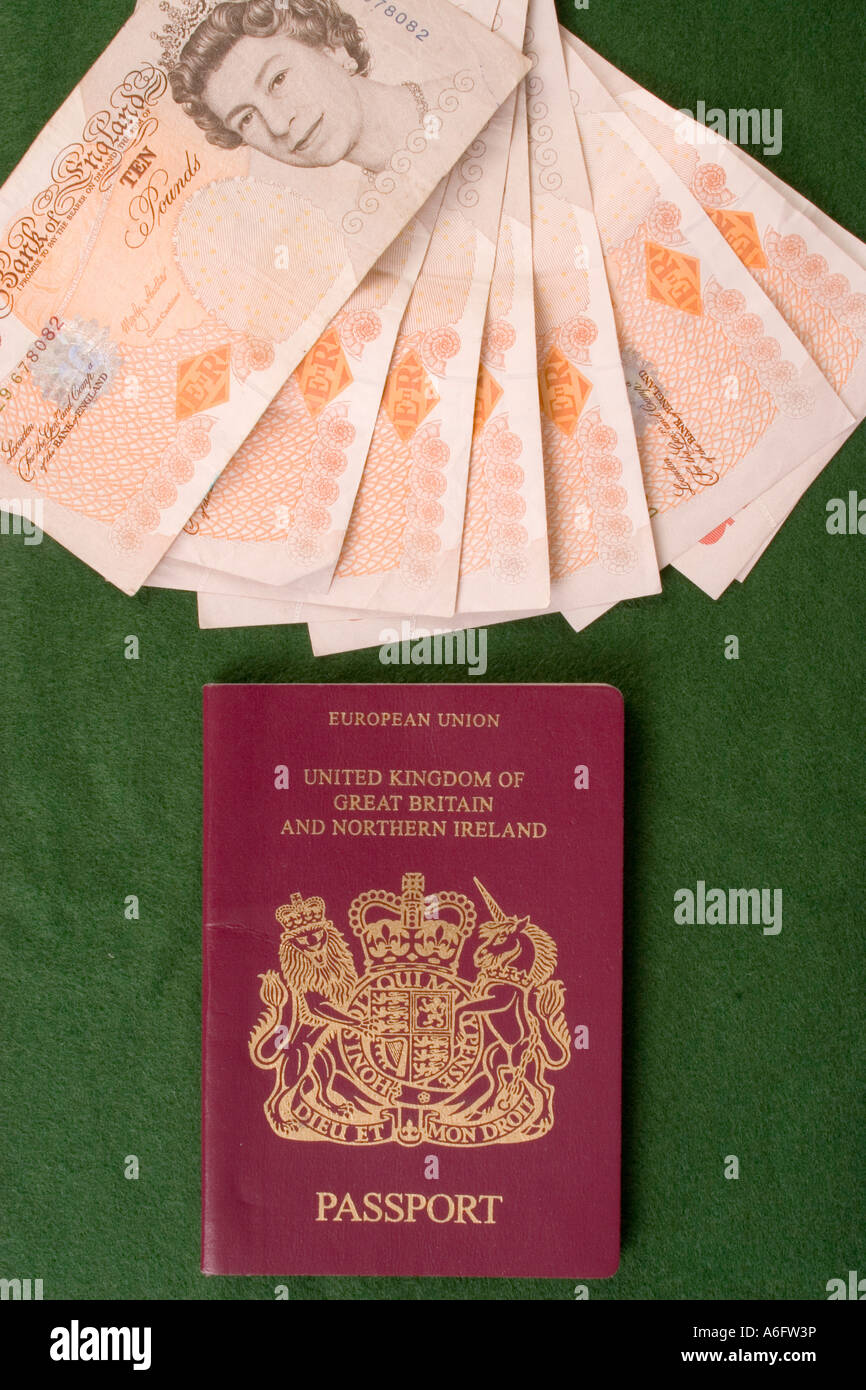 Passports for money Stock Photo - Alamy