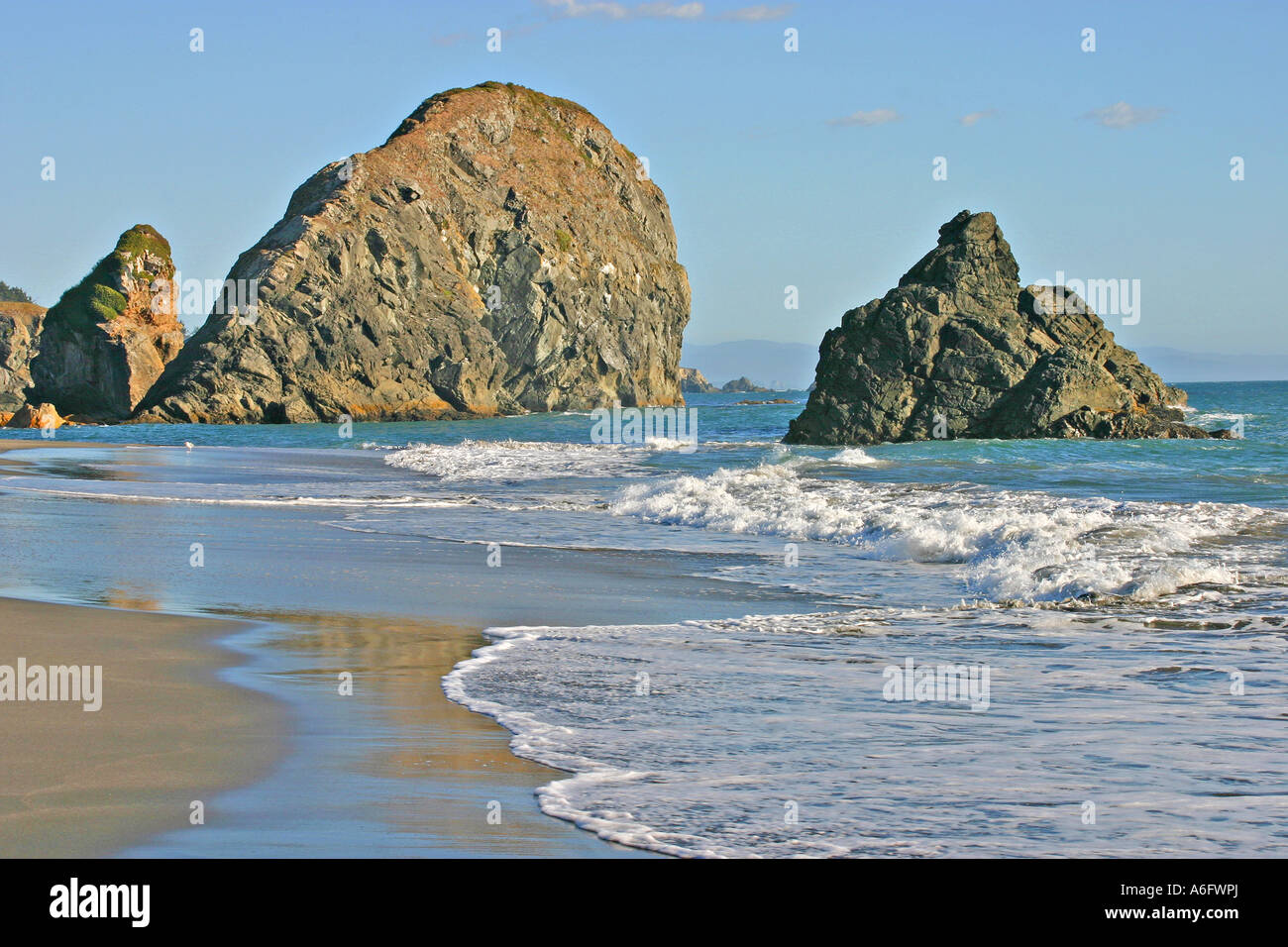 Sea stack rock formations at beach in Harris Beach State Park near ...