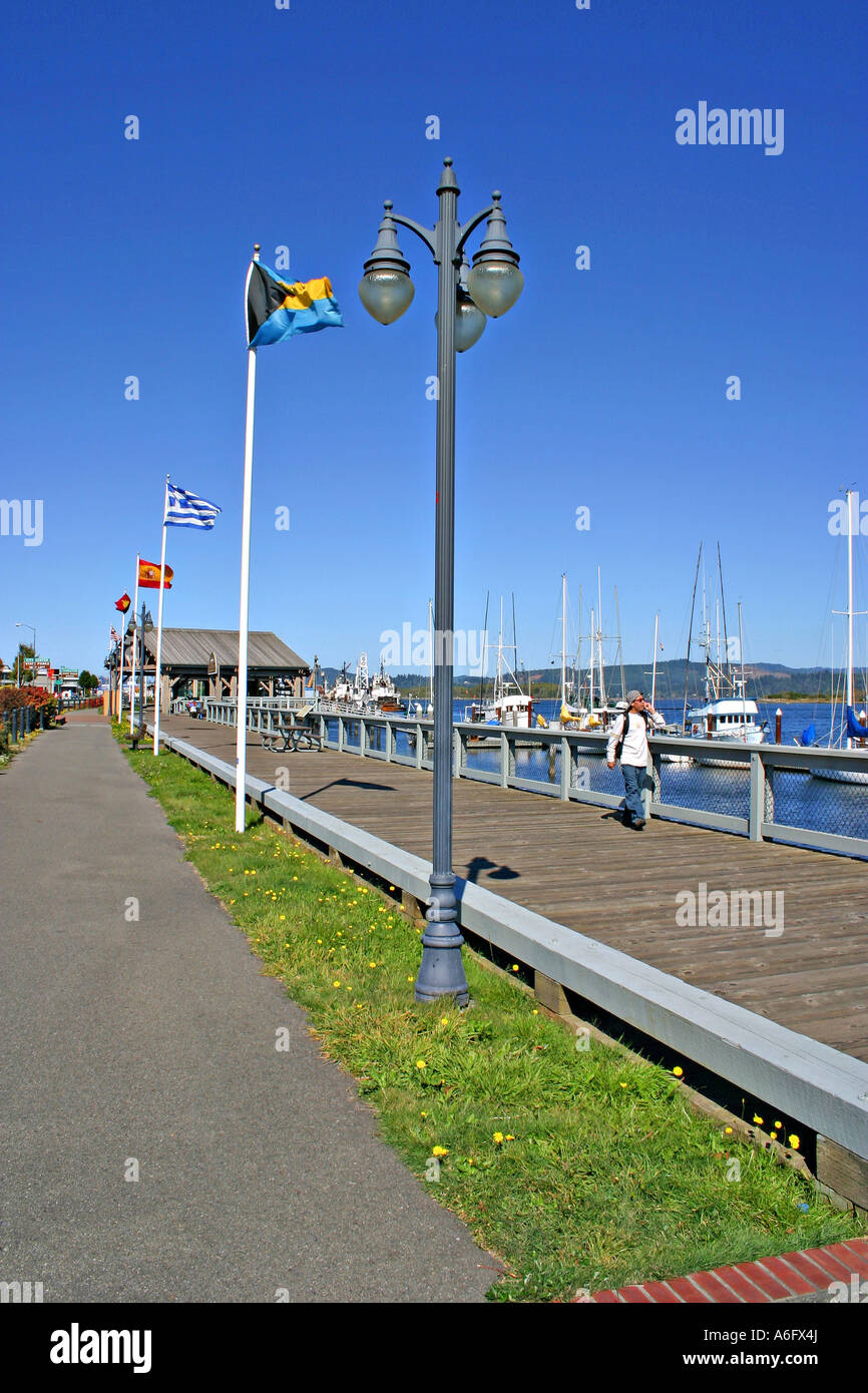 People walking on Boardwalk at Coos Bay Oregon Stock Photo - Alamy