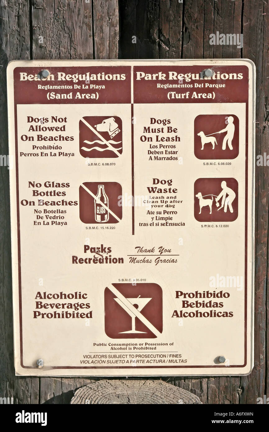 Bilingual sign on beach California Stock Photo - Alamy