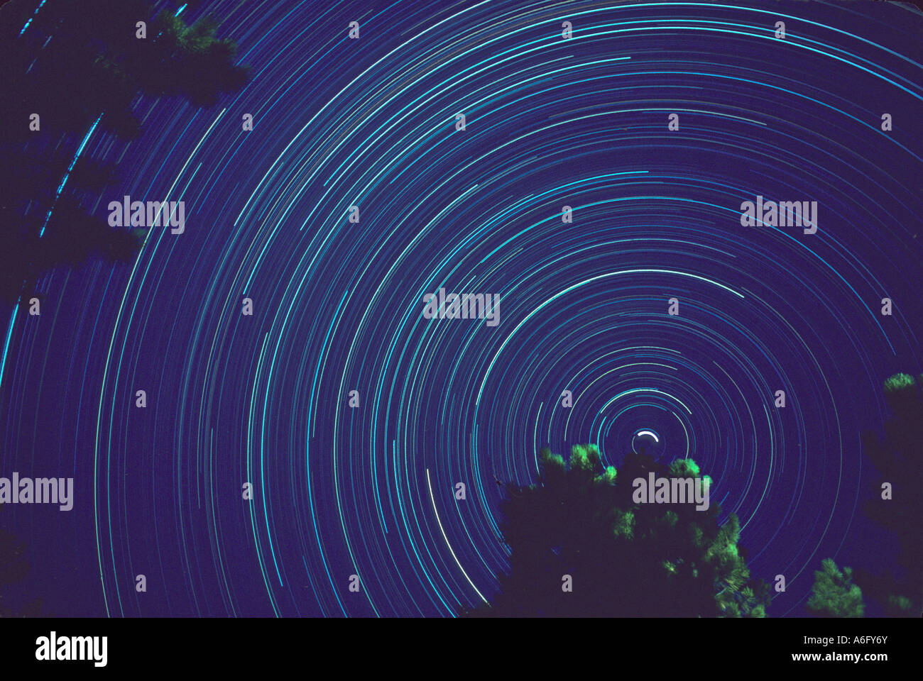 time exposure centered on North Star night star tracks from earths ...