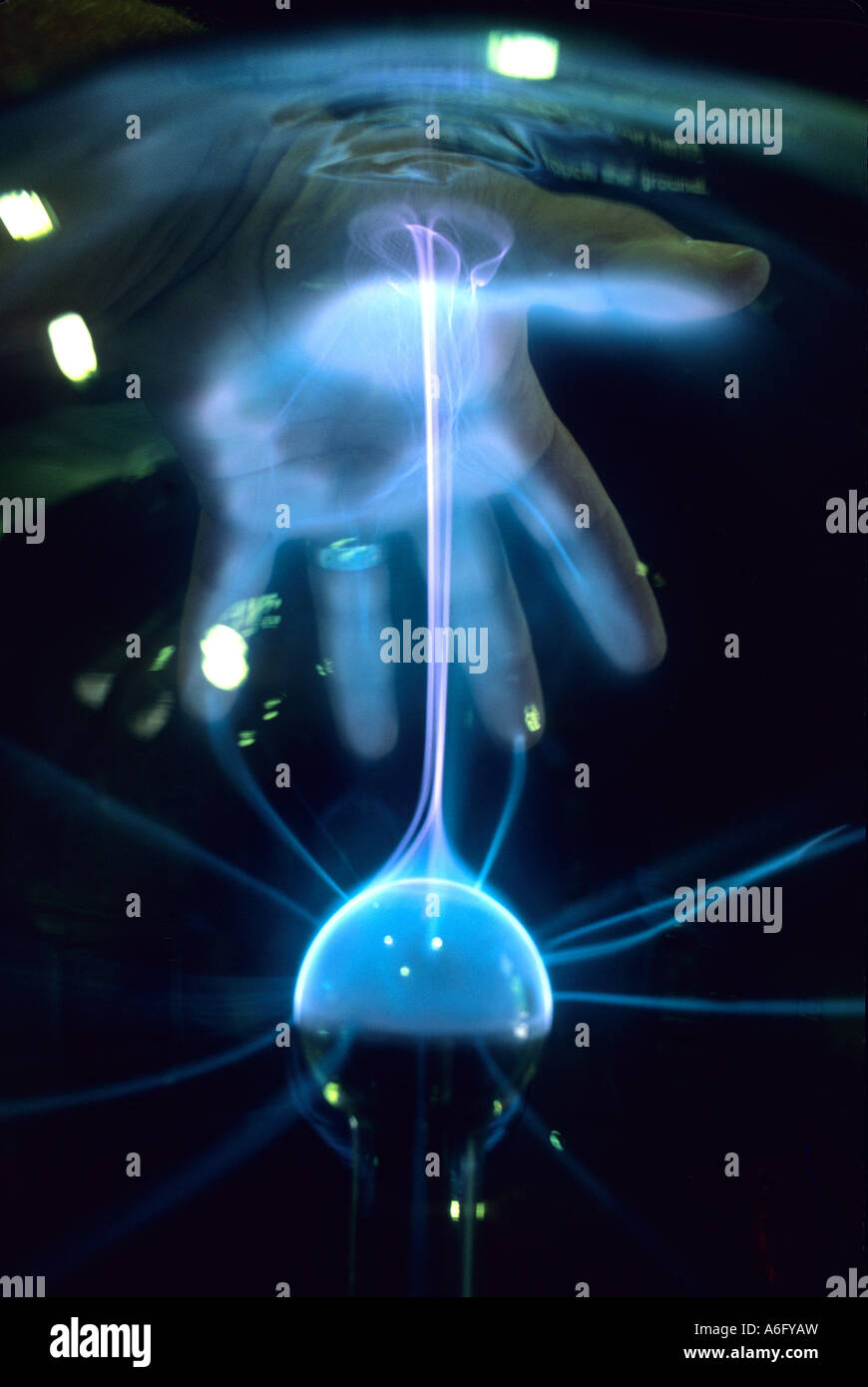 hand creating static electricity arc in plasma ball Duke Power Energy ...