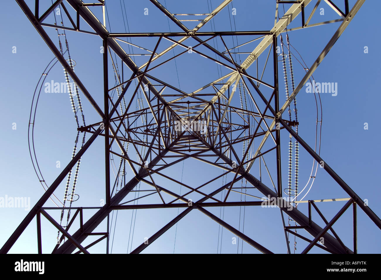 electricity pylon with blue sky view from the centre looking up Stock ...