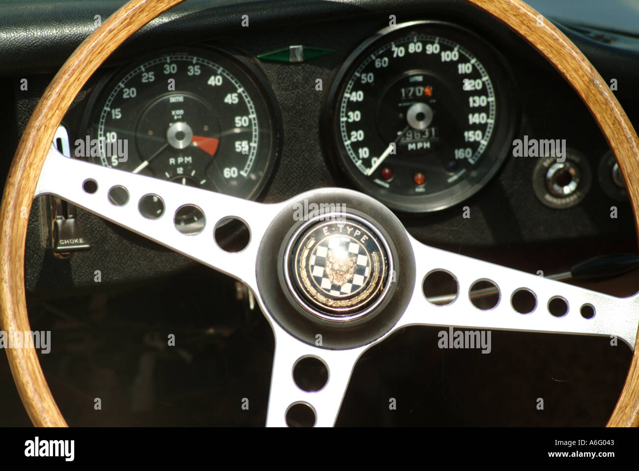 jaguar E type cockpit interior wood sports car dials speedo rev counter ...