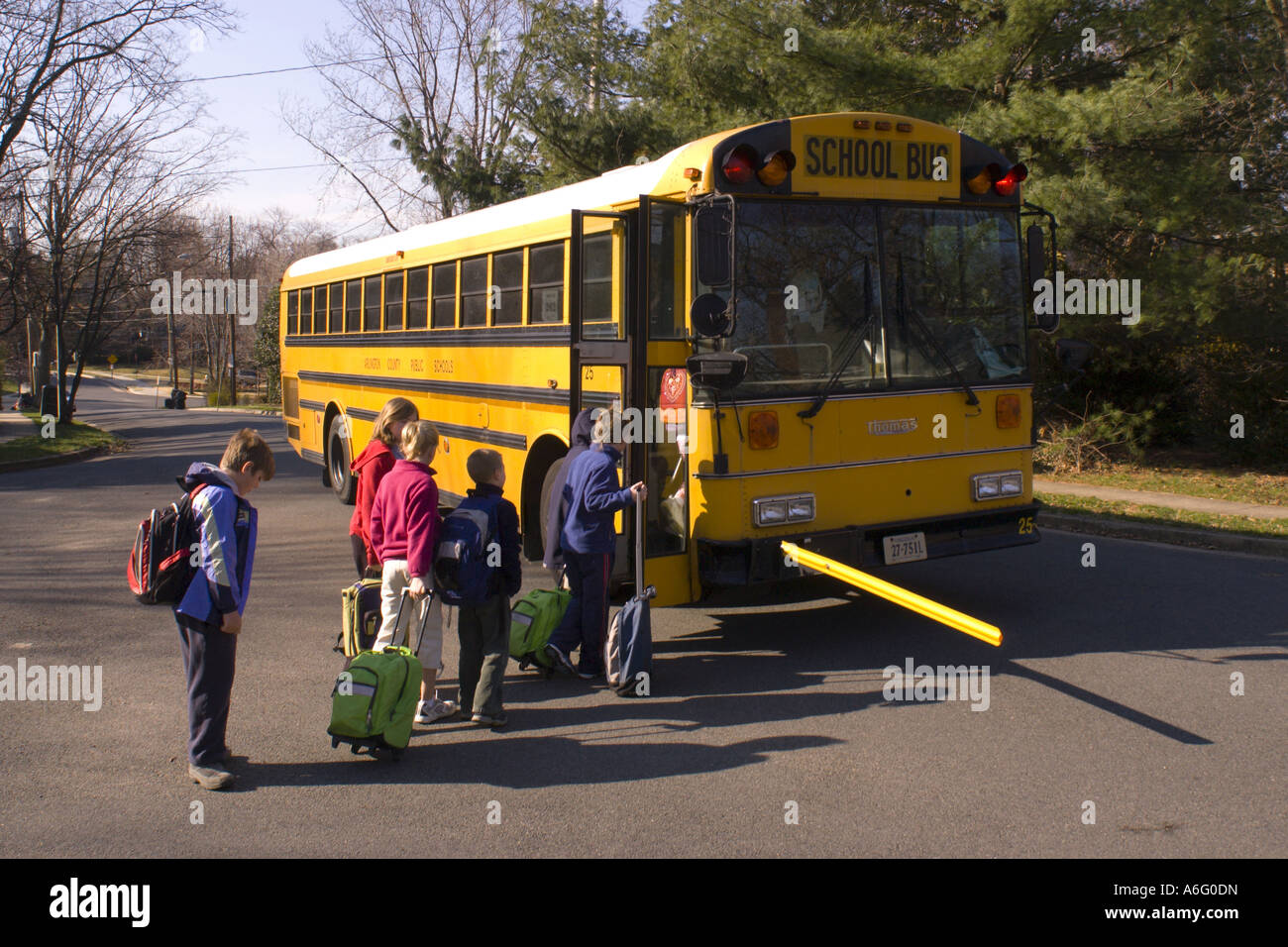 ARLINGTON VIRGINIA USA Elementary school children line up to board ...