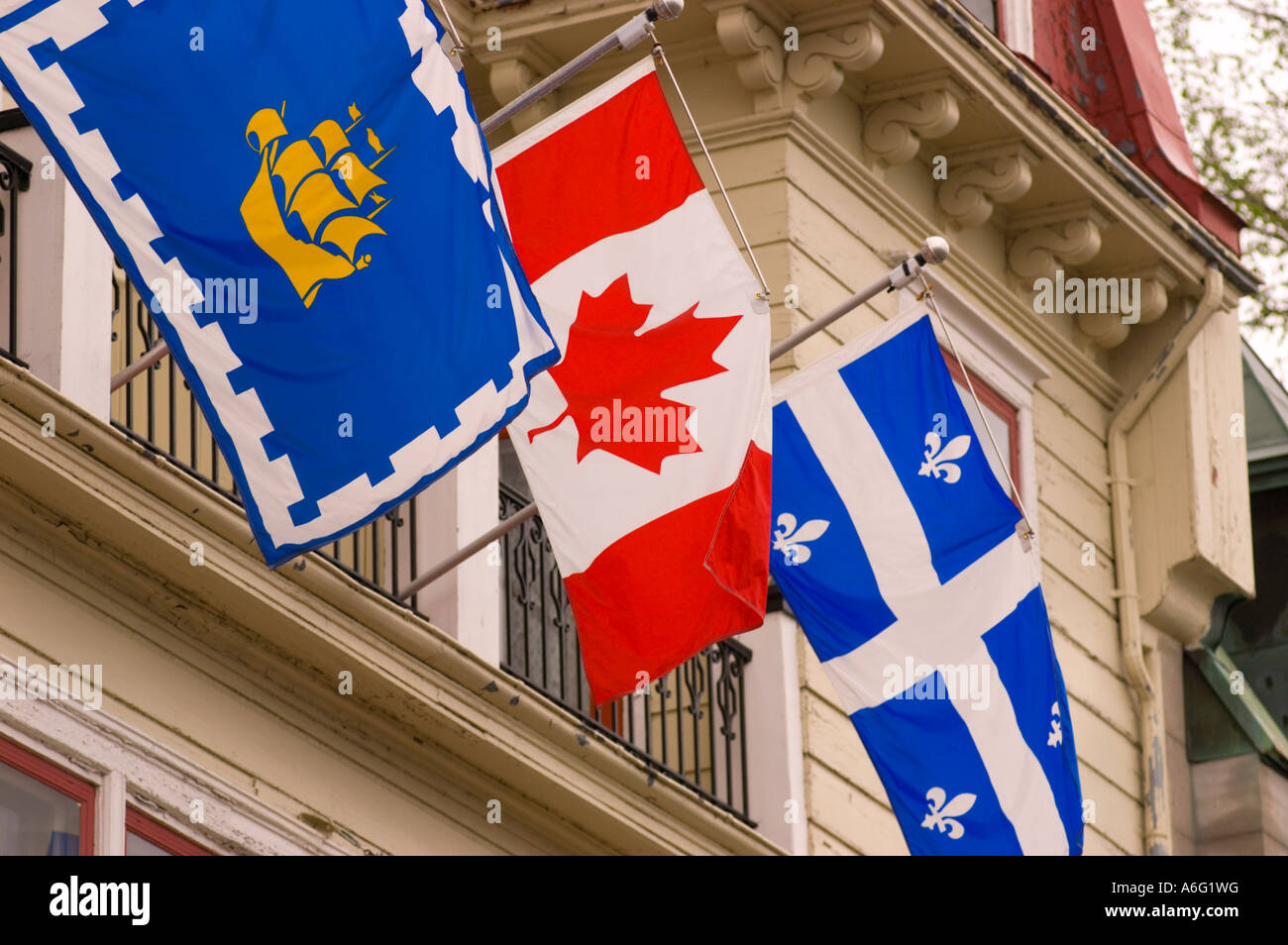 QUEBEC CANADA National and regional flags on display in Quebec City Left to right City of Quebec ...