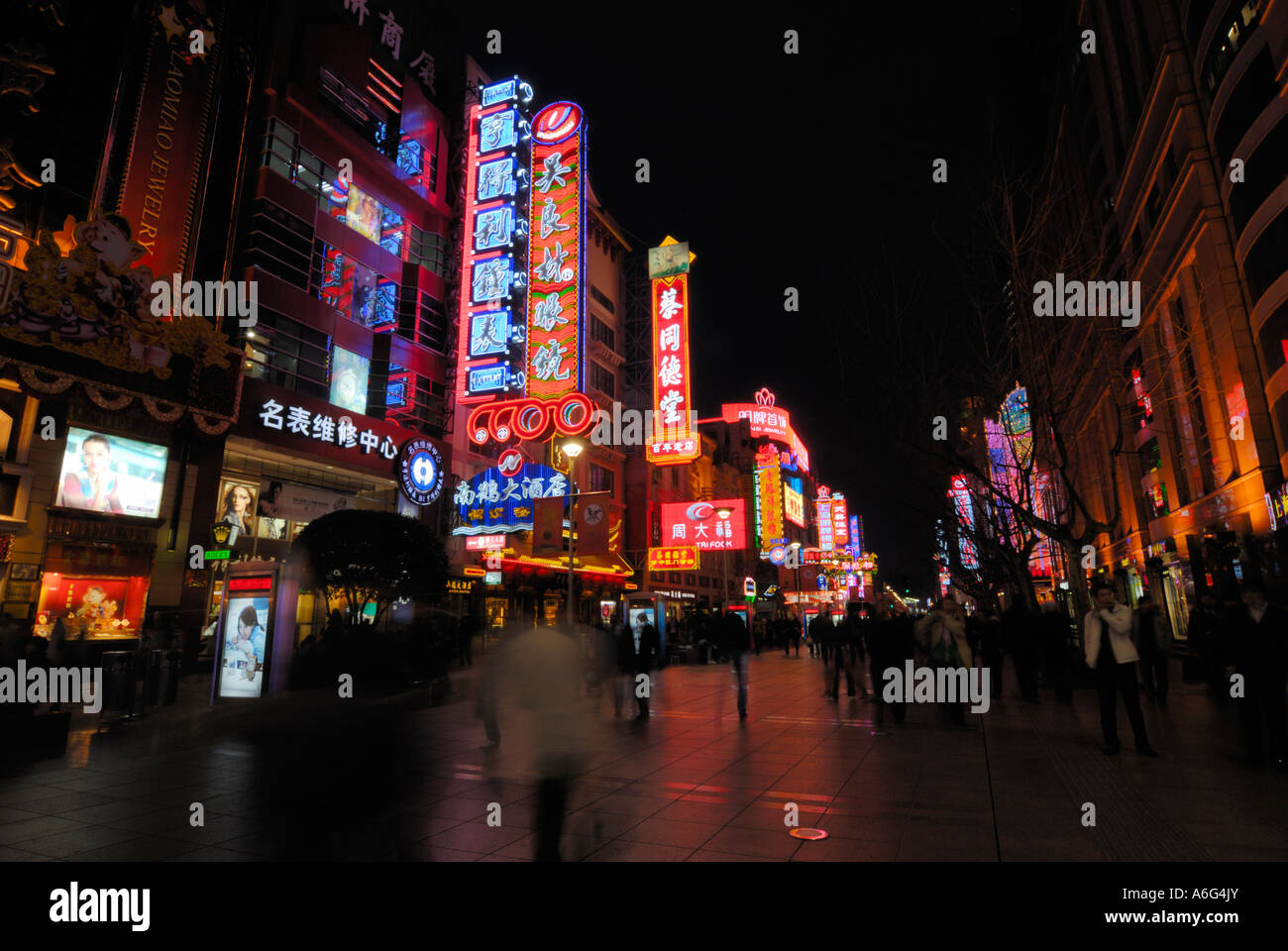 China Shanghai Neon lights on East Nanjing Road Stock Photo - Alamy
