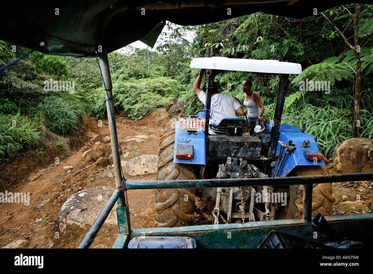 Tractor driving from Las Horquetas to Rara Avis in rainforest, Costa ...
