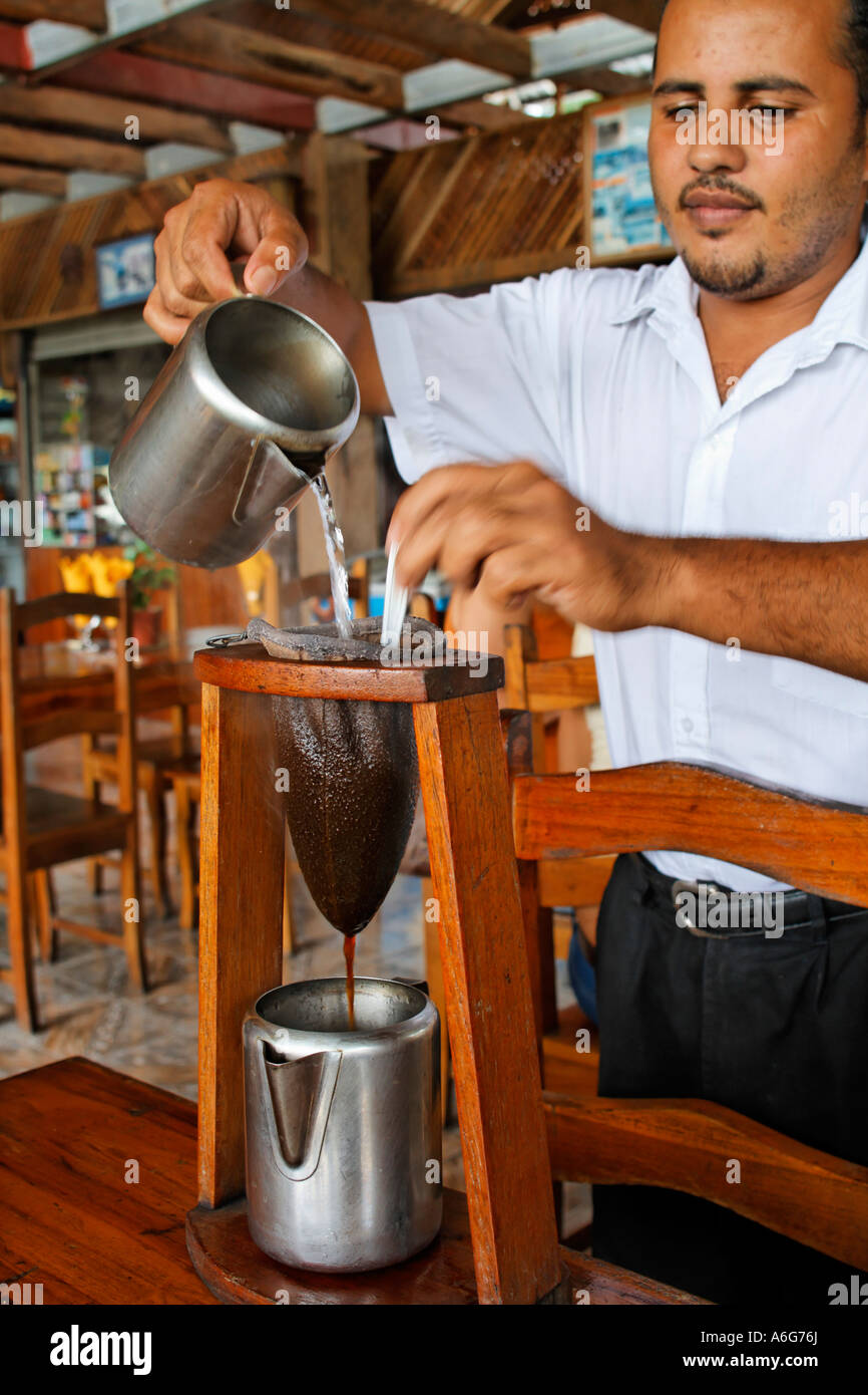 Man brewing fresh coffee, Costa Rica Stock Photo - Alamy
