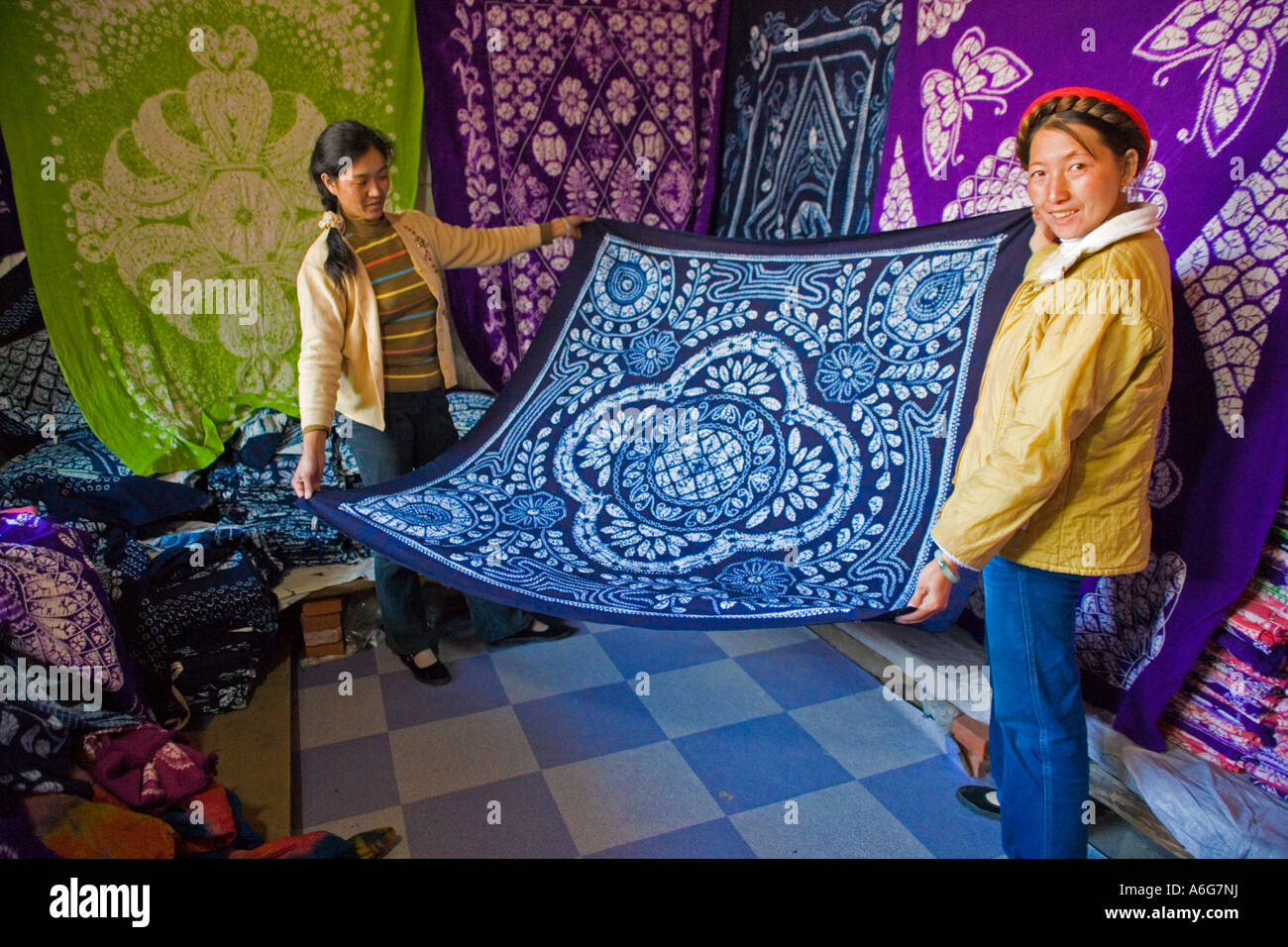 Assistants at tie dyeing factory Dali Yunnan Province China showing ...