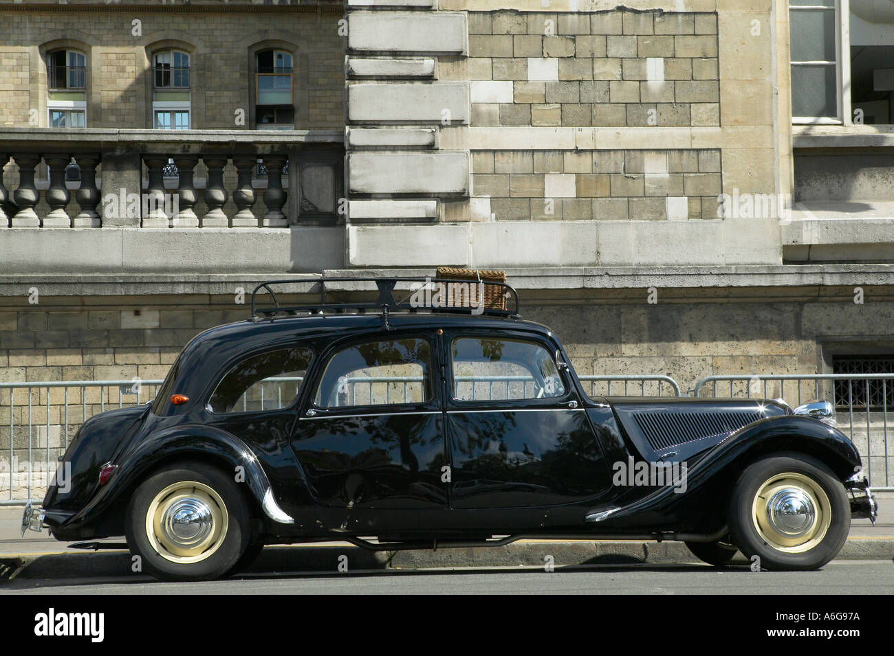 Classic black Citroen traction avant car in the streets of Paris France ...