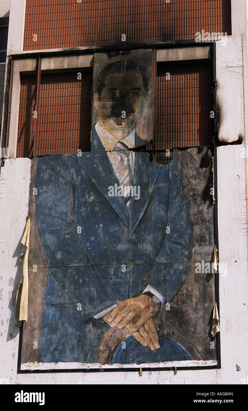 Baghdad Iraq 2003 Defaced portrait of Saddam Hussein Stock Photo - Alamy