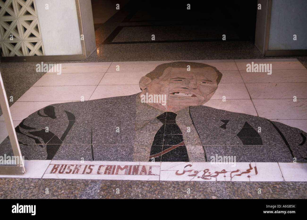 Baghdad.Mural of President Bush senior at entrance to Al Raschid hotel ...