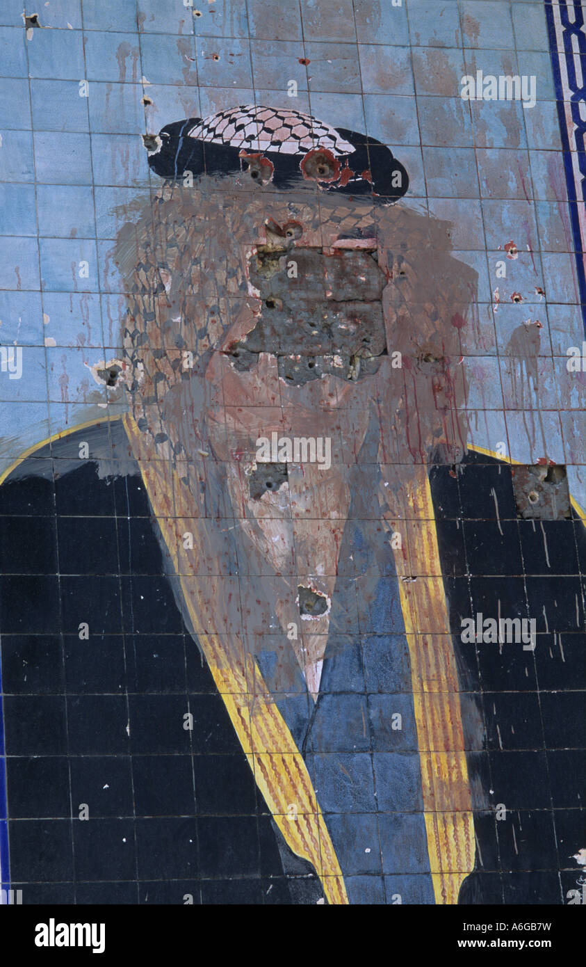 Iraq Road to Hilla June 2003 Defaced portrait of Saddam Hussein Stock ...