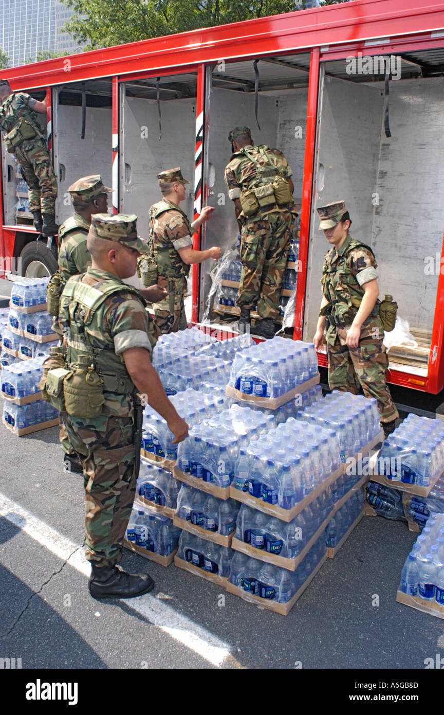 Marines back from Iraq unloading water in heat Stock Photo - Alamy
