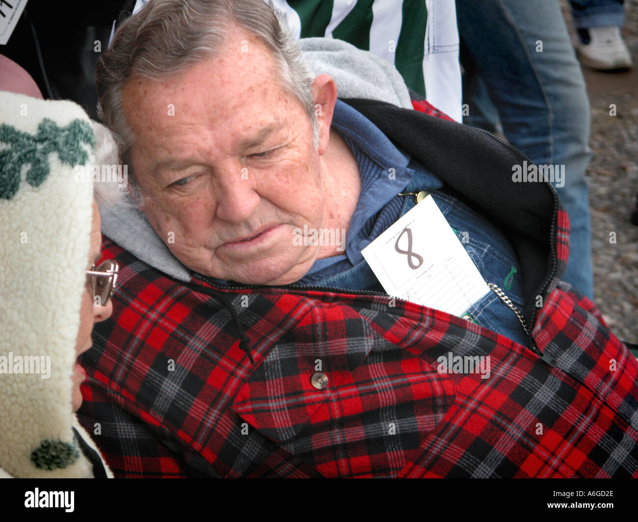 white senior gray man who is over weight, a bidder Man at Auction ...
