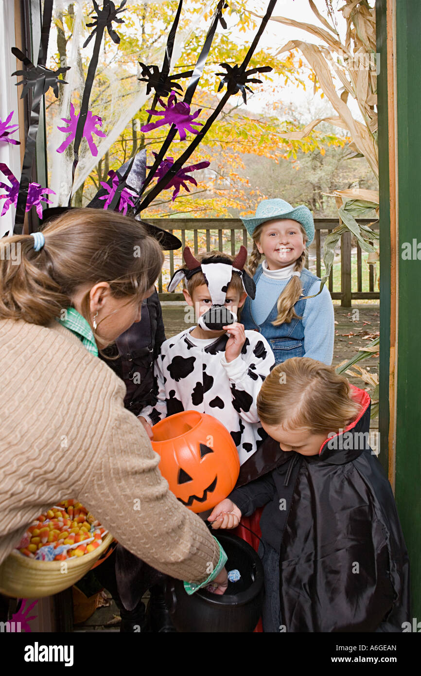 Children getting halloween treats Stock Photo - Alamy
