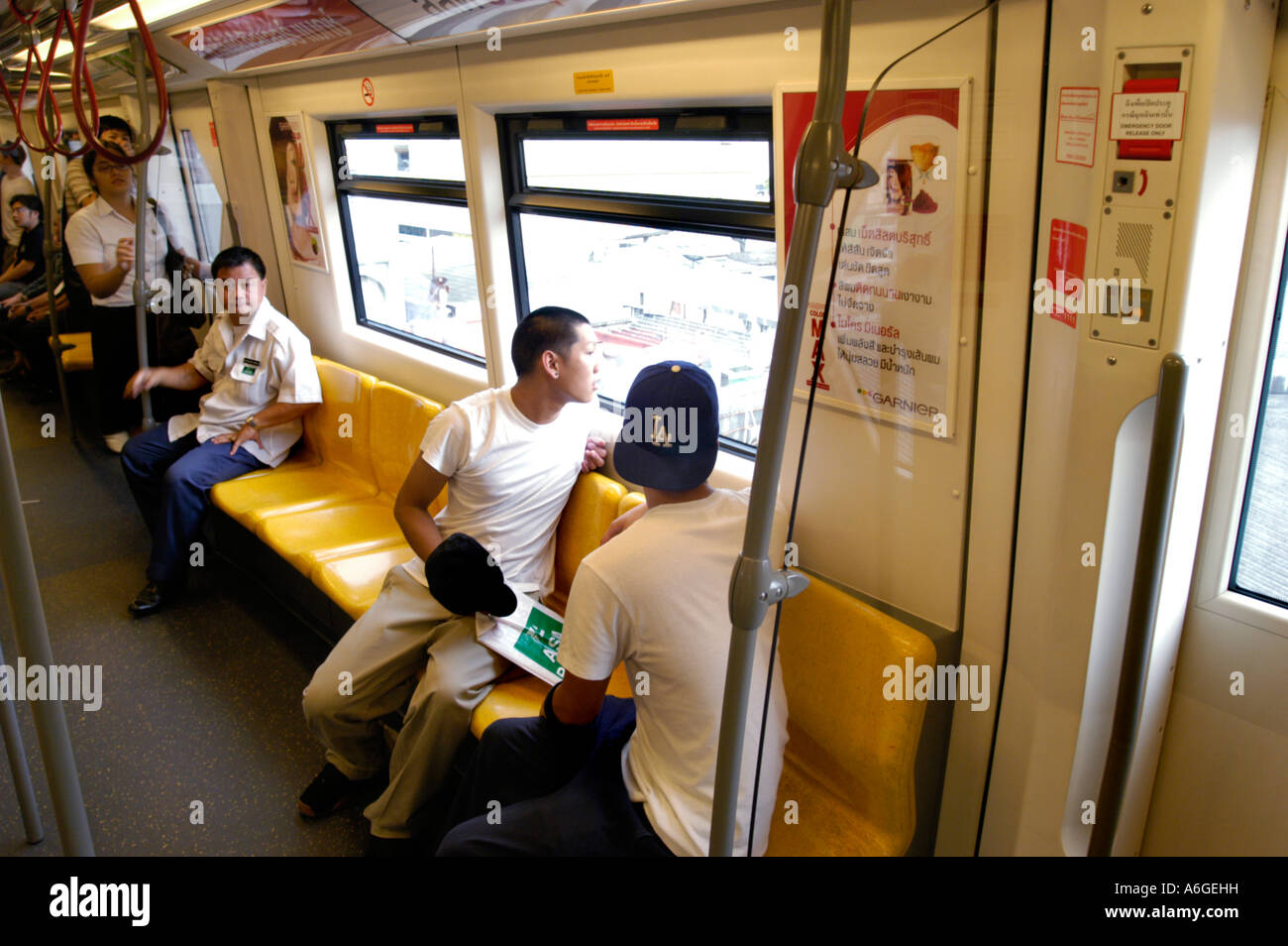 Thailand, Bangkok In the skytrain, a rail based mass transit system ...