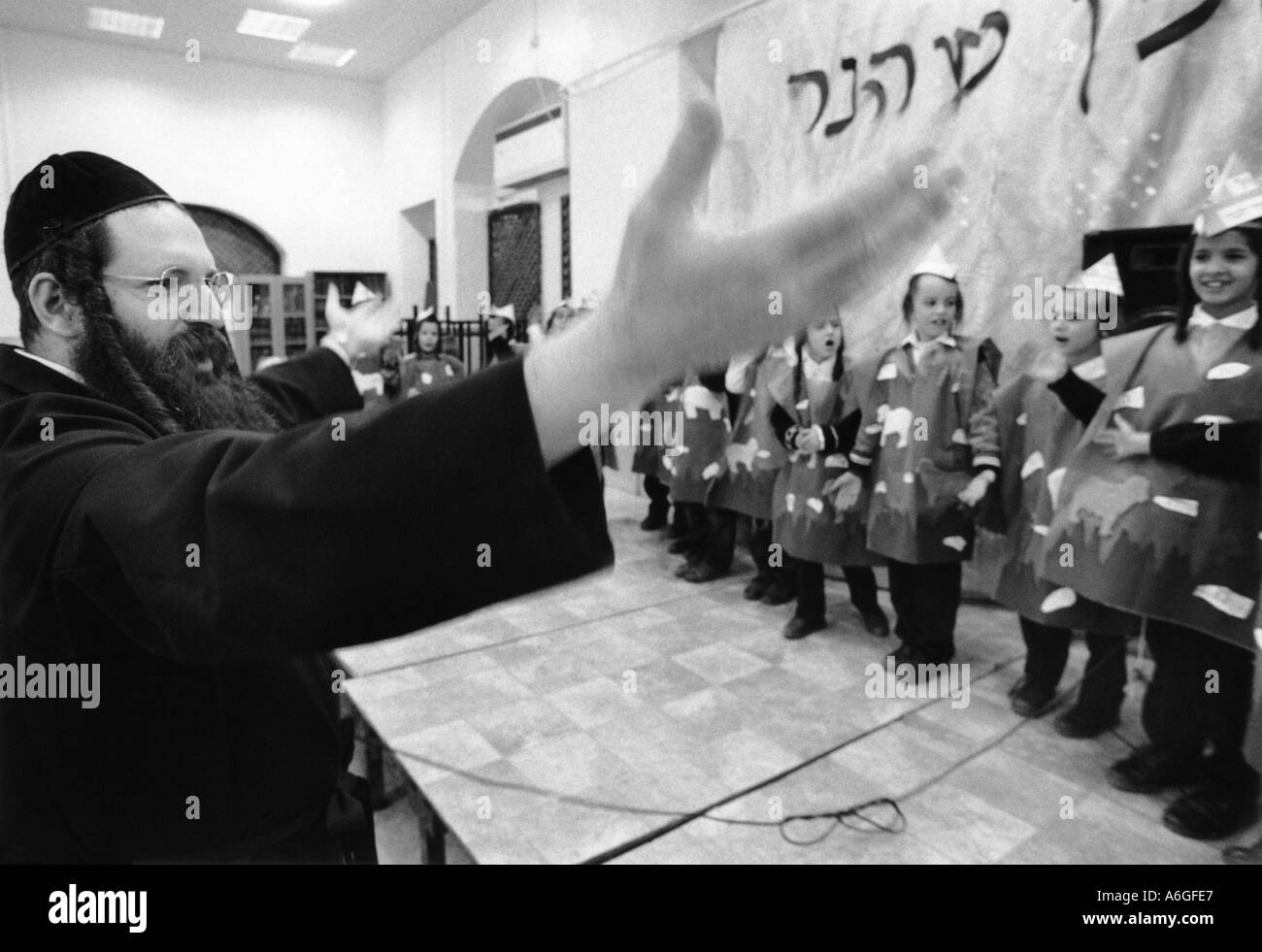 Israel Jerusalem Beit Isarel Mea Shearim rabbi directing a children s ...