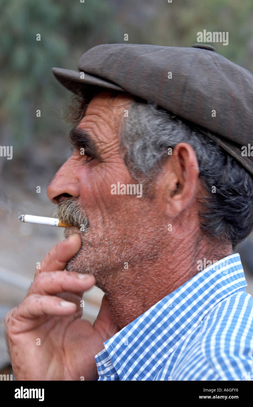 Portrait of man with moustache hat and cigarette Stock Photo - Alamy