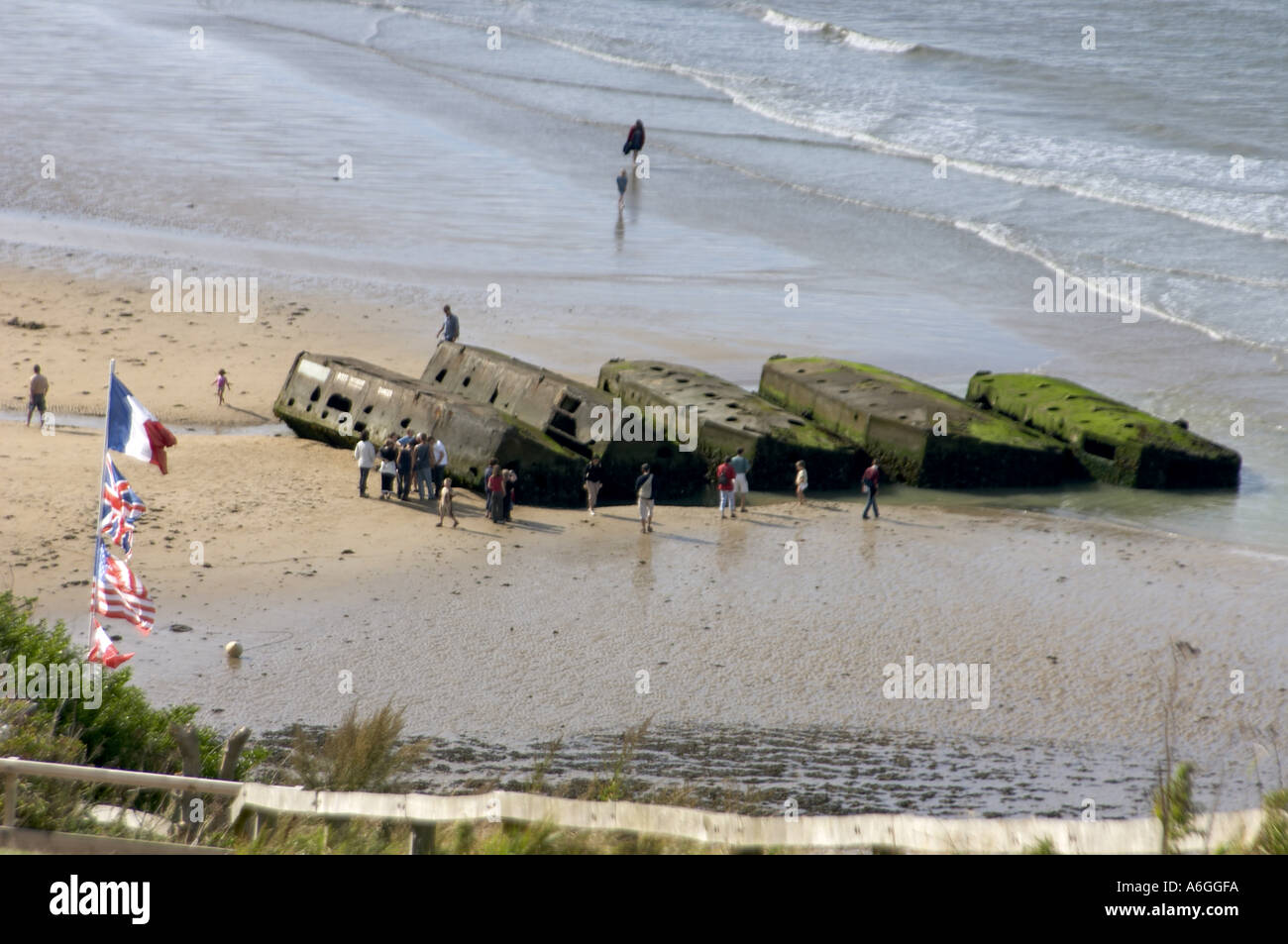 Ruins of Mulberry Harbours on the beach near Arromanches Normandy ...