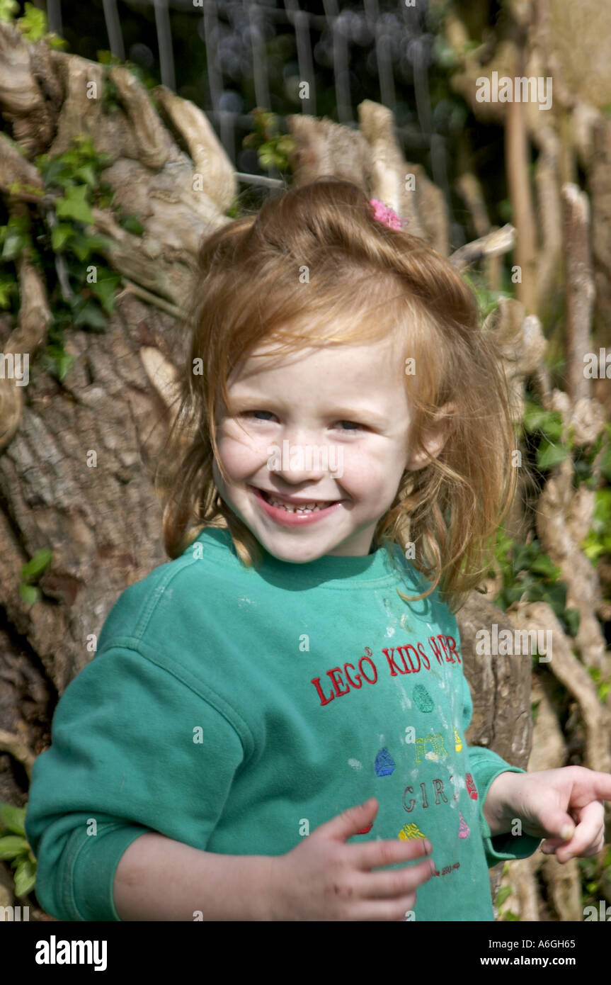 Young girl with red hair looking happy and smiling Ruth Leader Stock ...