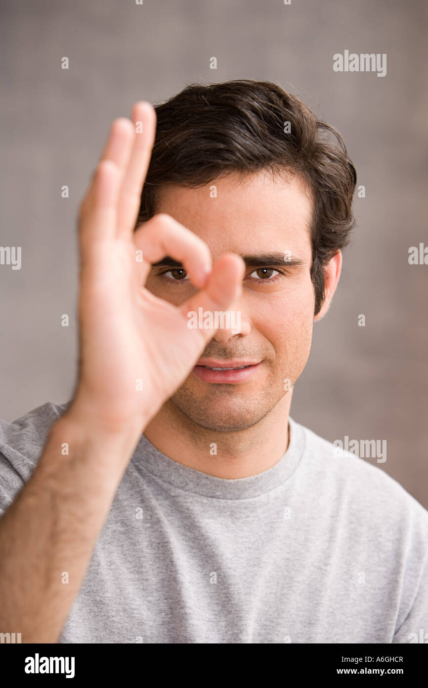 Approval gesture hispanic man close hi-res stock photography and images ...