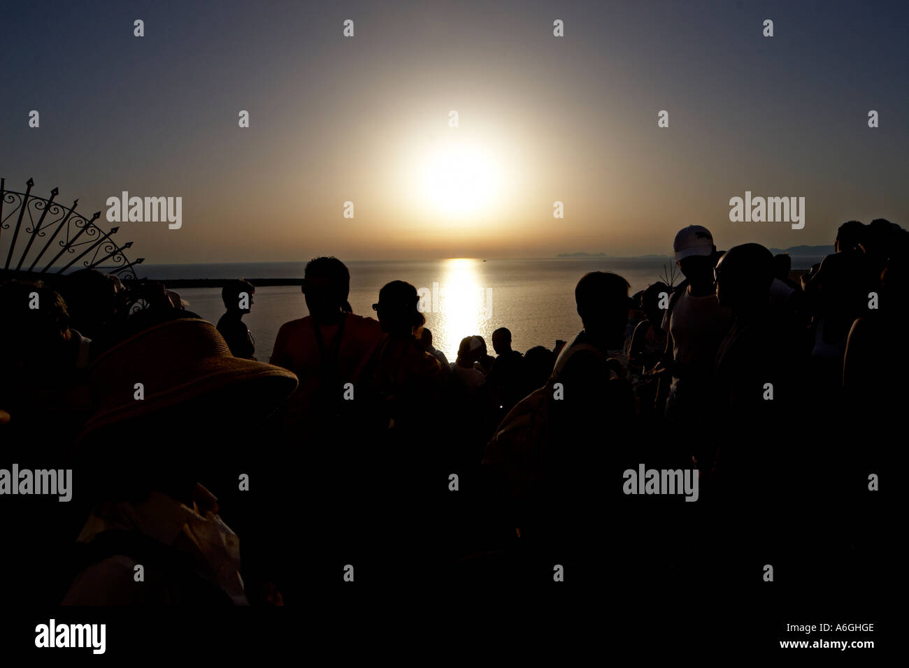 People tourists and visitors gathering in the evening to watch the ...