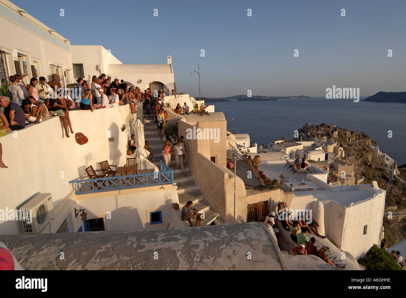 People tourists and visitors gathering in the evening to watch the ...