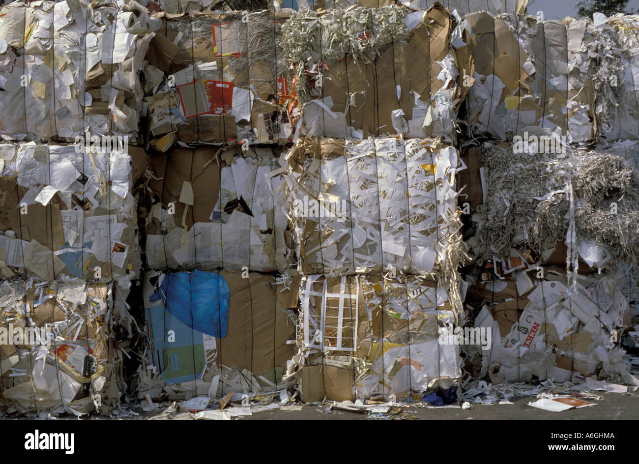 Big pile of pressed waste paper bales Stock Photo - Alamy