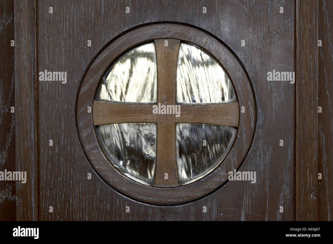 Abstract image of light coming through crucifix cross shaped window ...