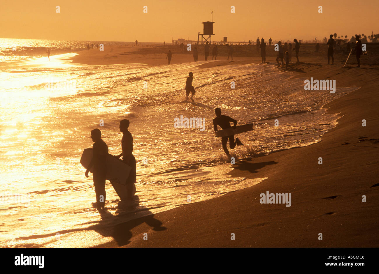 Surfers Balboa Beach Sunset Los Angeles USA Stock Photo - Alamy
