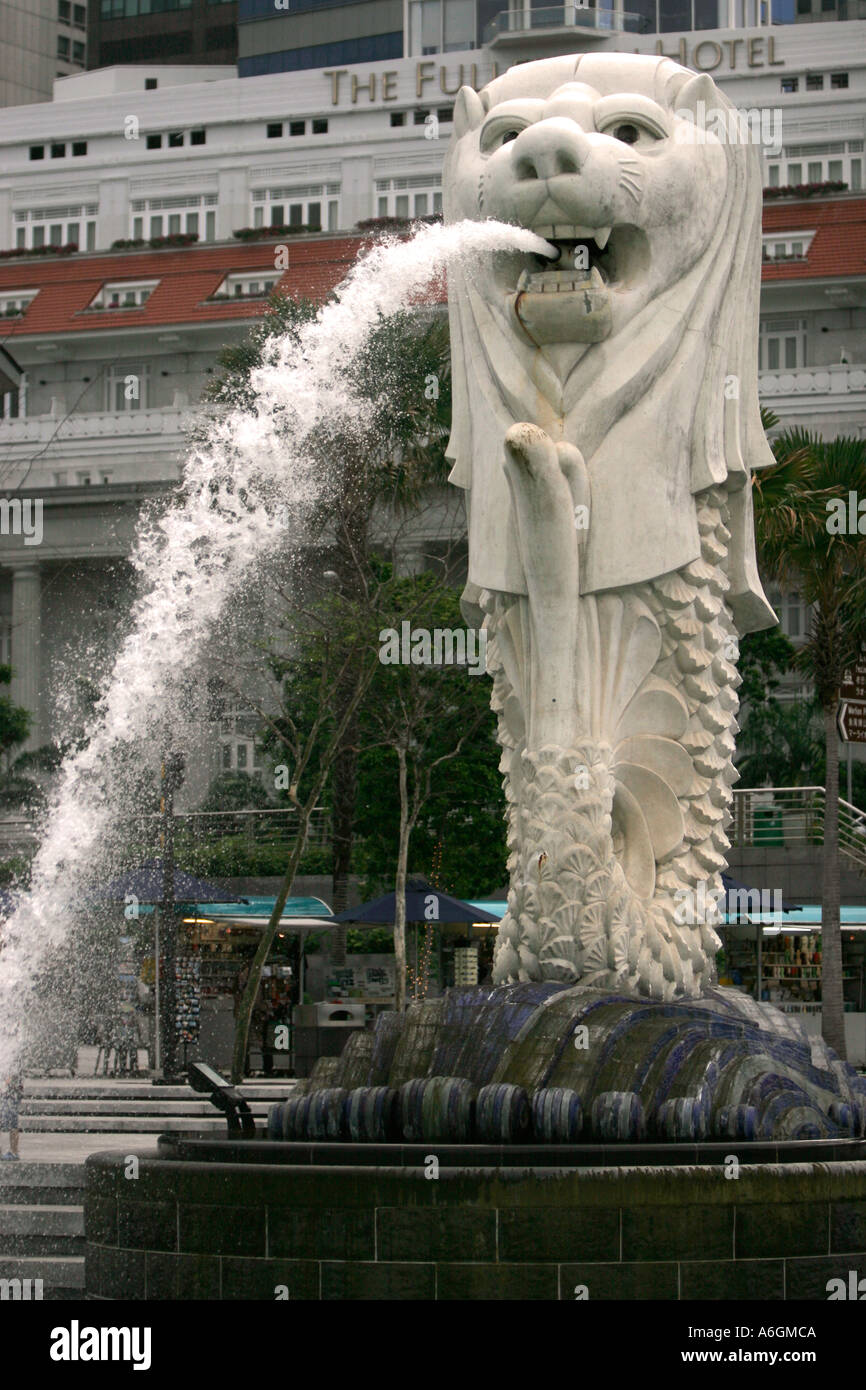 Merlion fountain at Merlion Park across from the luxury Fullerton Hotel ...