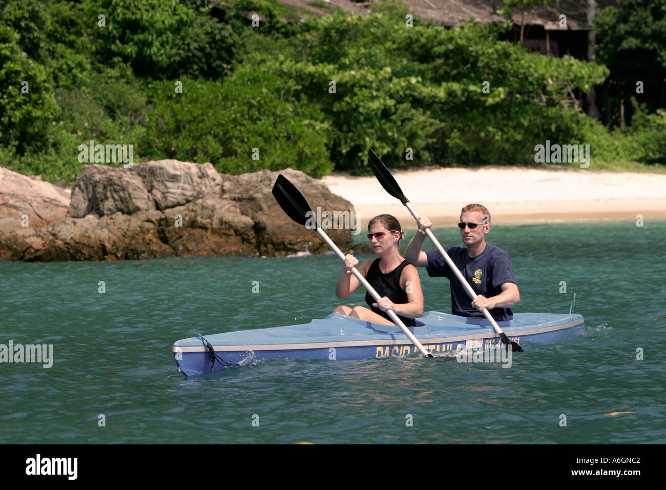 Couple kayaking off Perhentian Besar Malaysia Stock Photo - Alamy