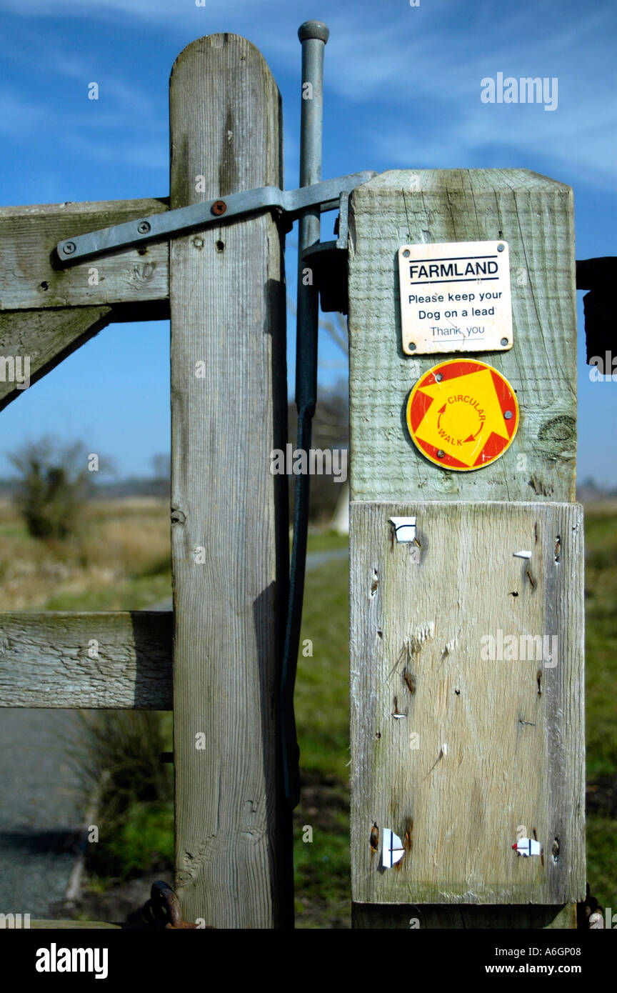 Information signs on a gate post Stock Photo - Alamy