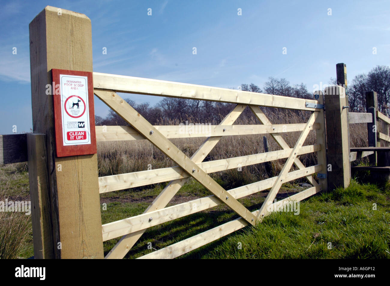 Information sign on a gate post Stock Photo - Alamy