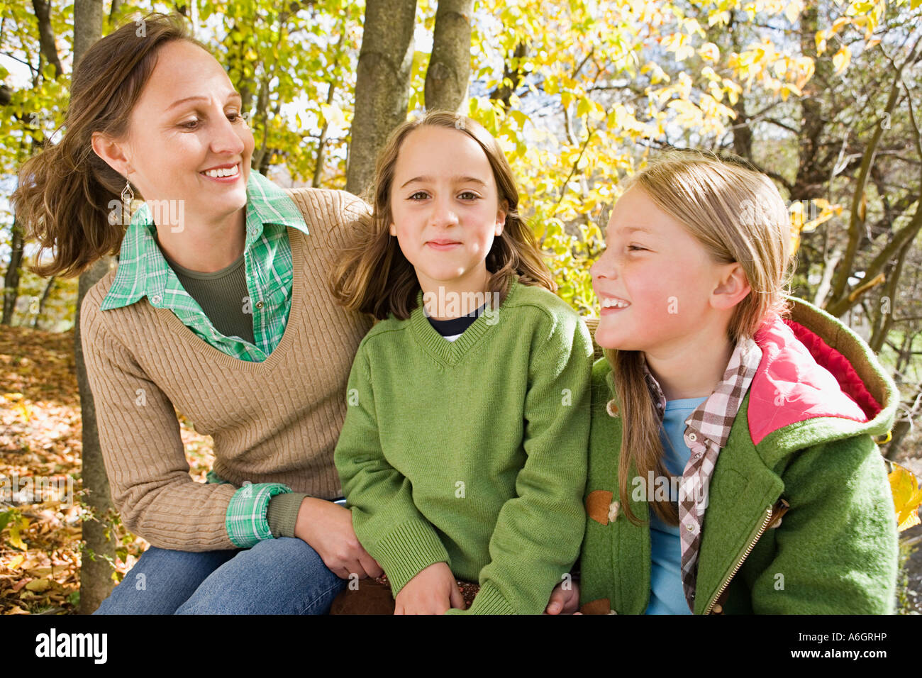 Woman and girls Stock Photo - Alamy