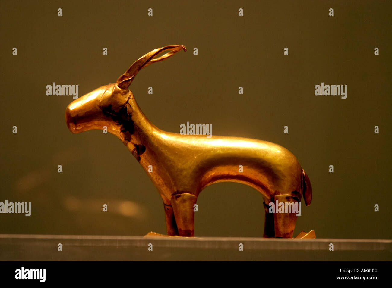 Old golden Ibex figurine Late Cycladic 17C Stock Photo - Alamy